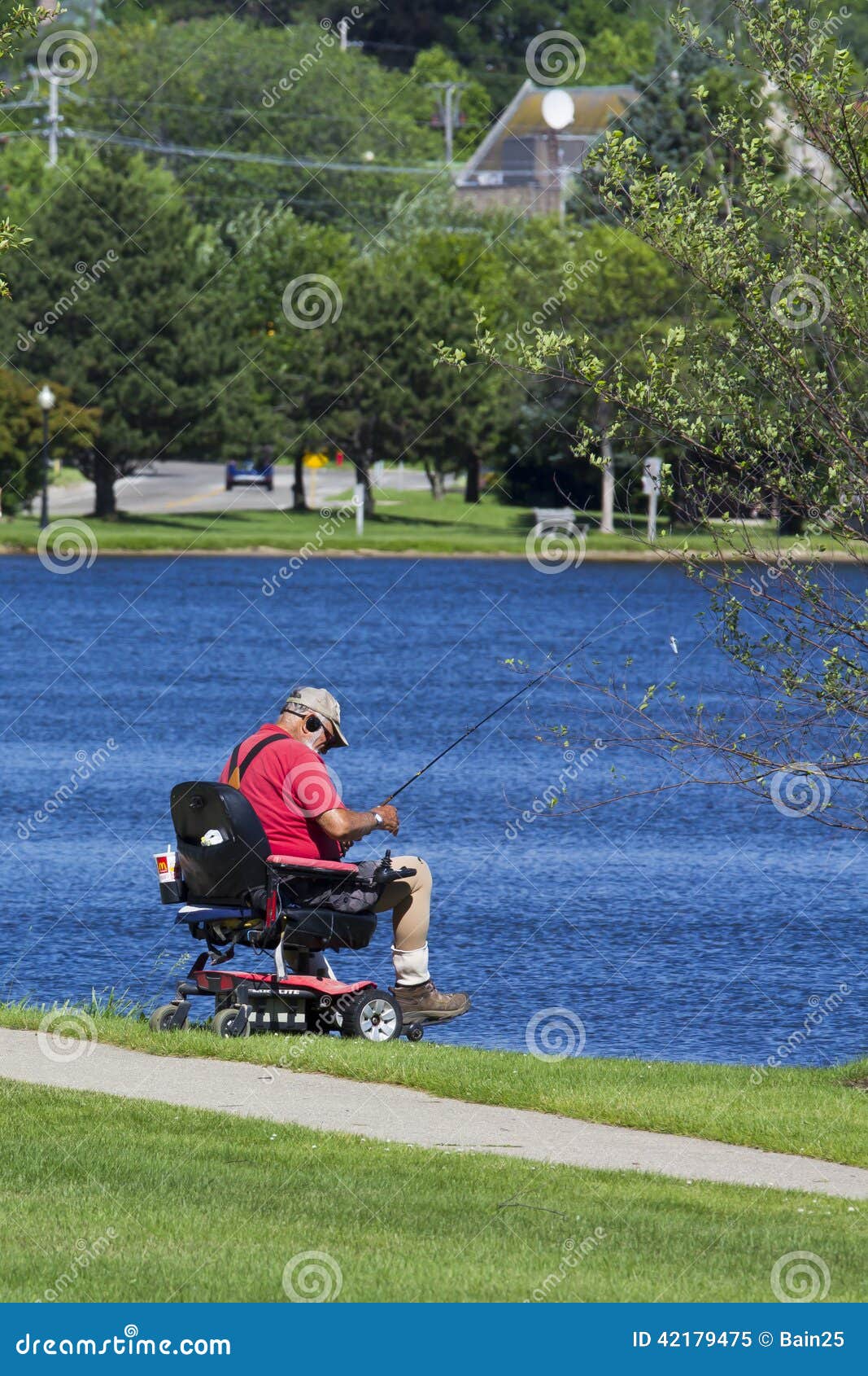 Disabled Man Fishing in a Lake Editorial Image - Image of trees ...