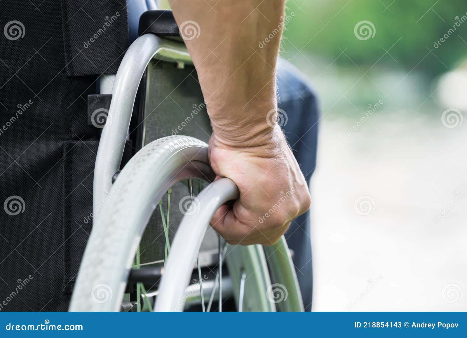 Disabled Man Pushing Wheel of Wheelchair Stock Image - Image of ...