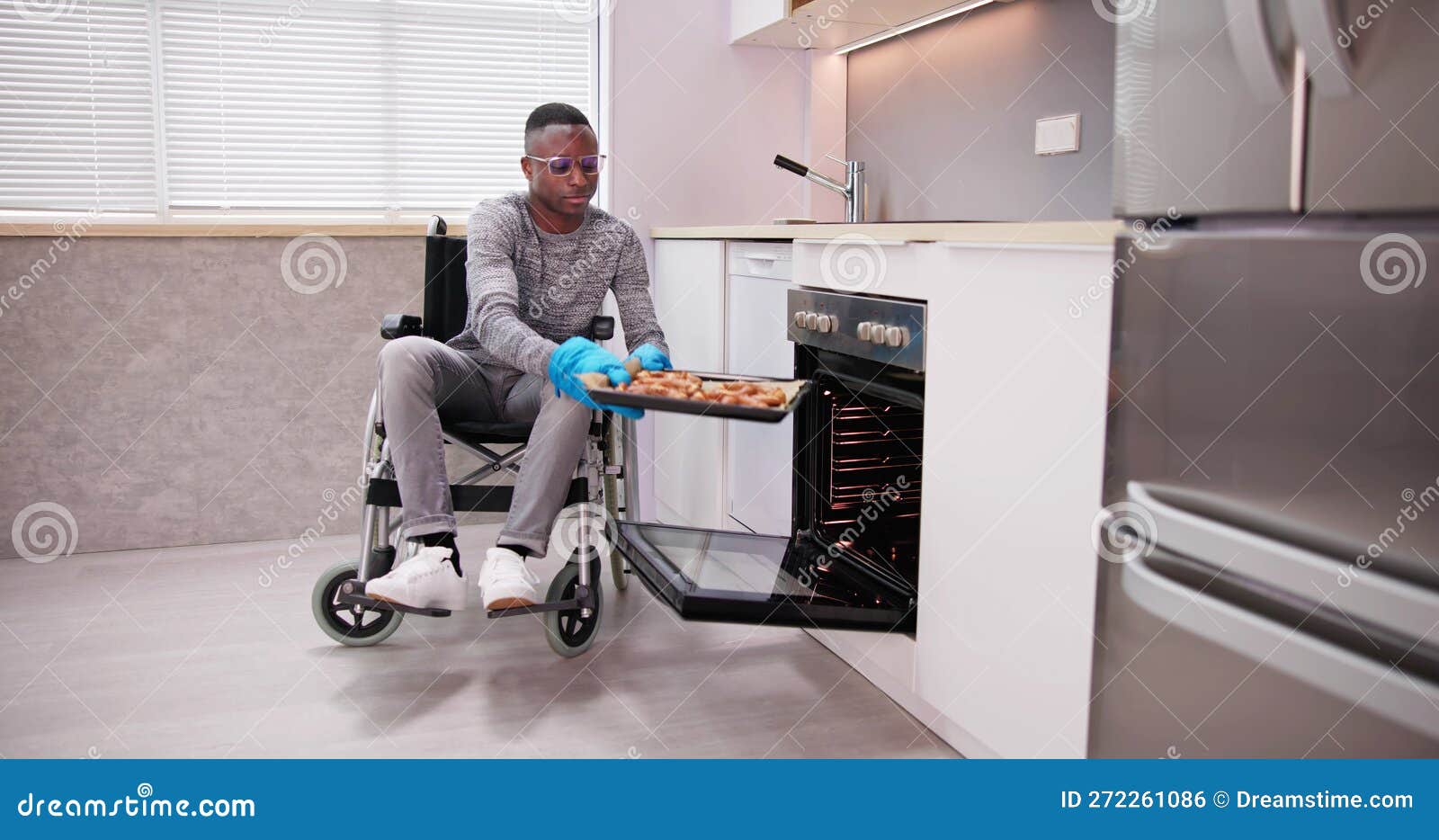 Disabled Man Using Microwave Oven for Baking Stock Photo - Image of ...
