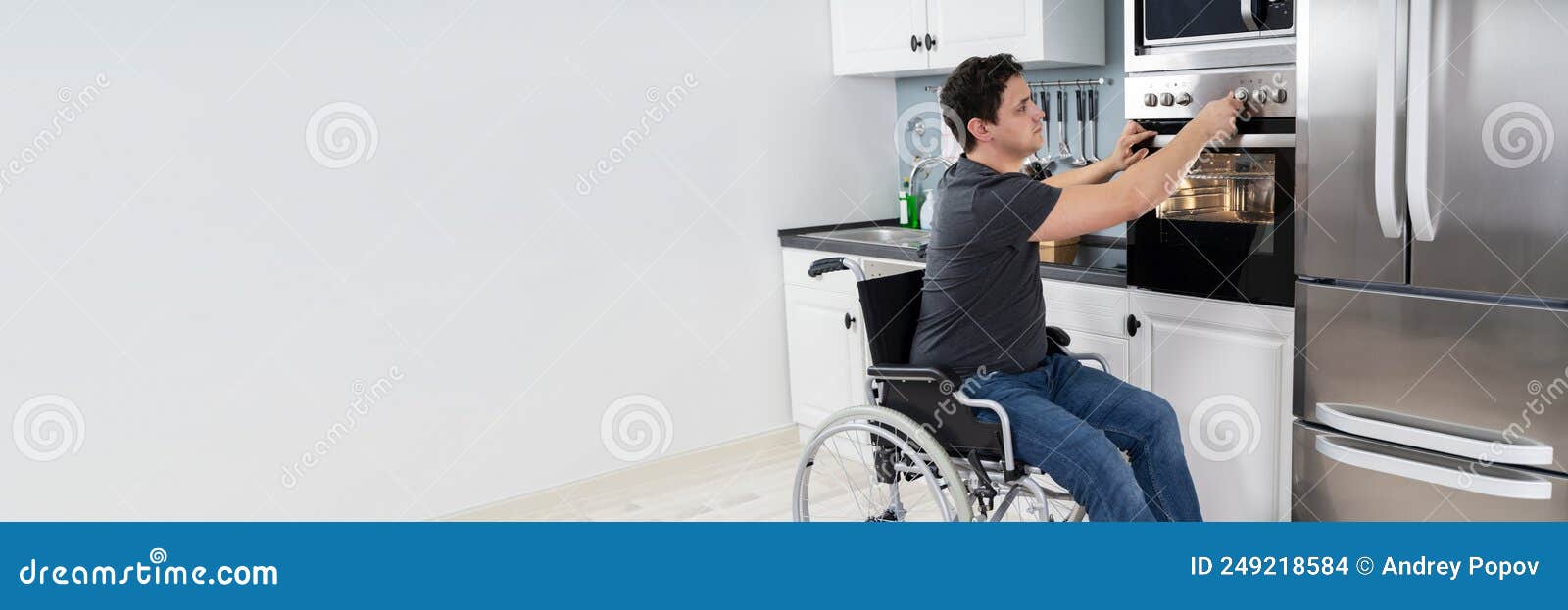 Disabled Man Using Microwave Oven in Kitchen Stock Photo - Image of ...