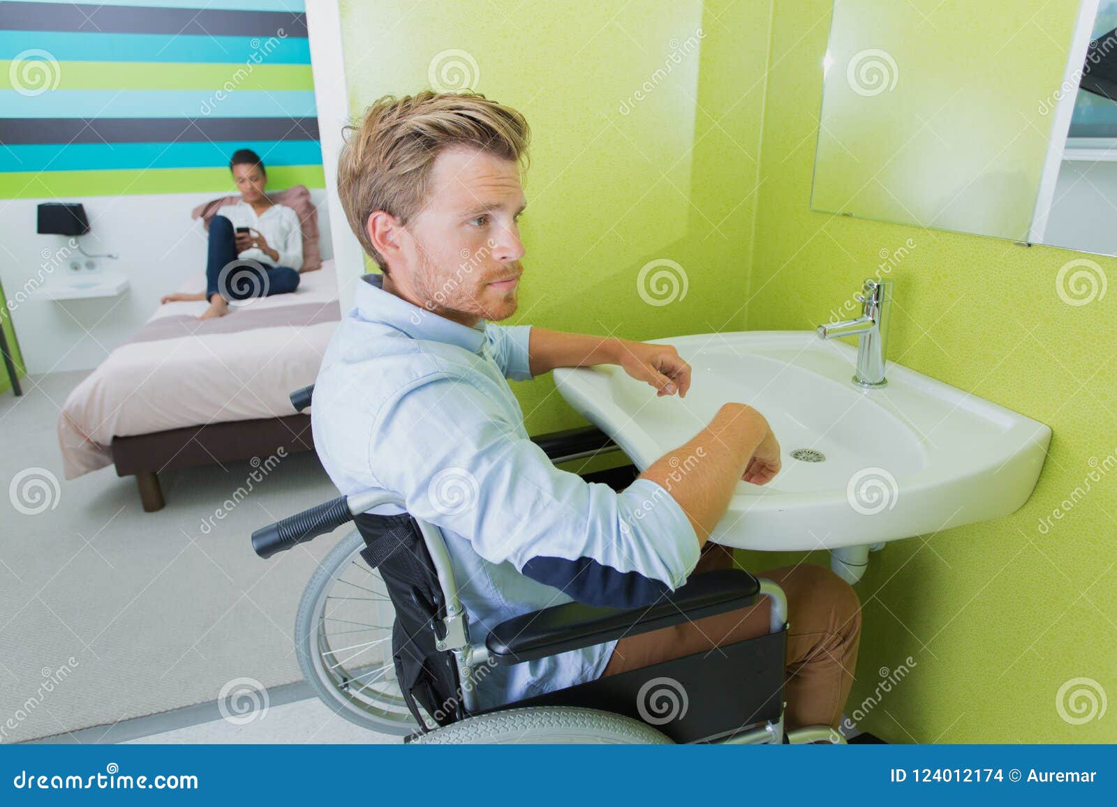 Disabled Man Using Sink in Hotel Room Stock Photo - Image of male ...
