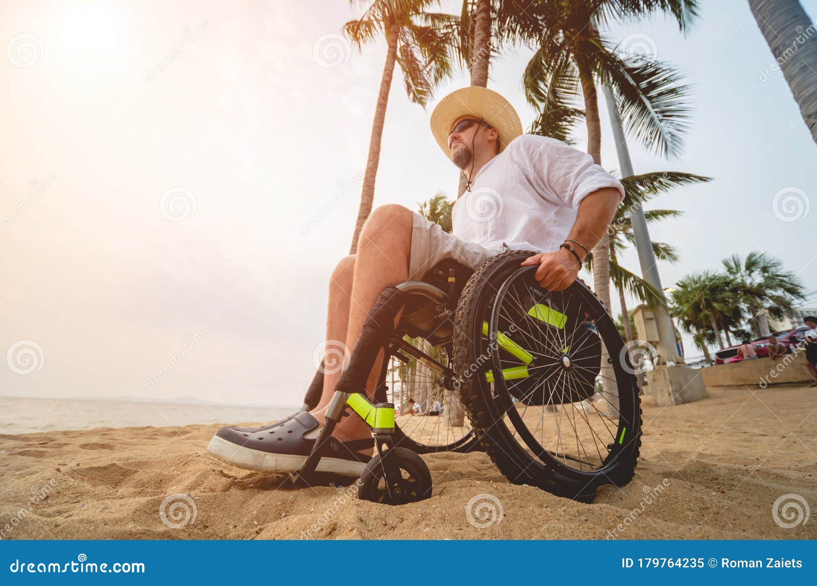 Disabled Man in a Wheelchair on the Beach. Stock Image - Image of beach ...