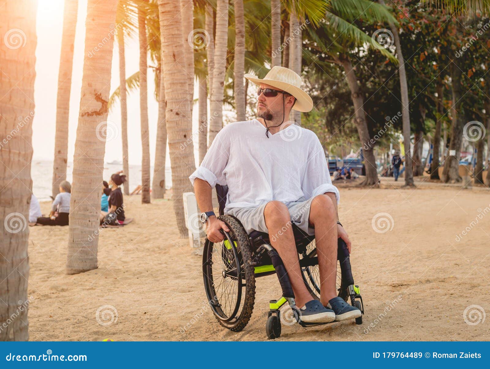 Disabled Man in a Wheelchair on the Beach. Stock Image - Image of male ...