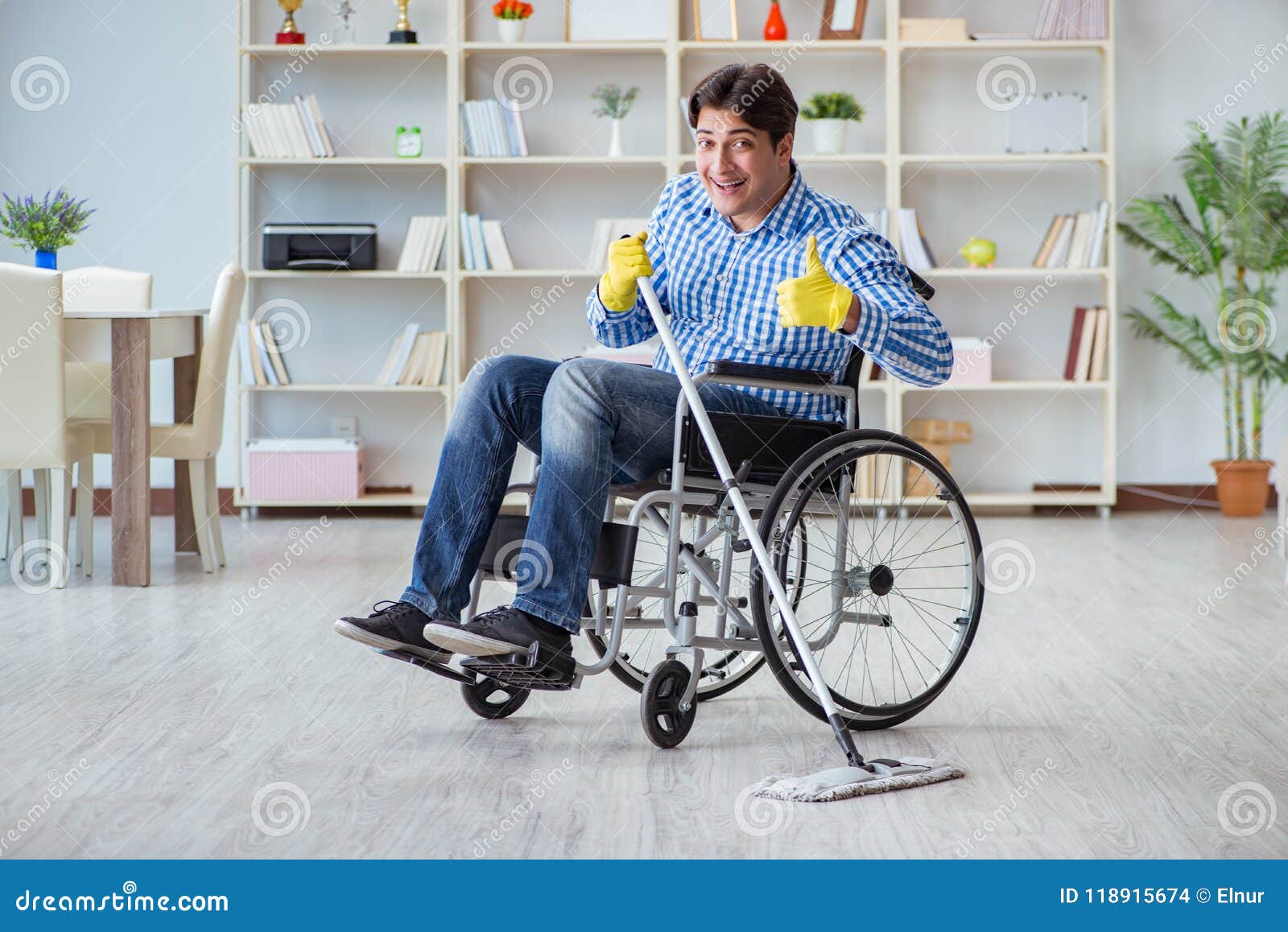 The Disabled Man on Wheelchair Cleaning Home Stock Photo - Image of ...