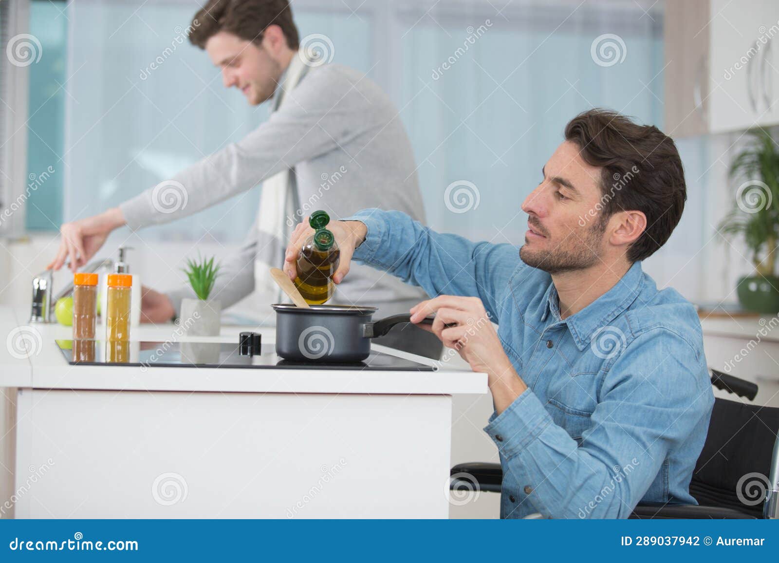 Disabled Man in Wheelchair Cooking Meal in Kitchen Stock Photo - Image ...