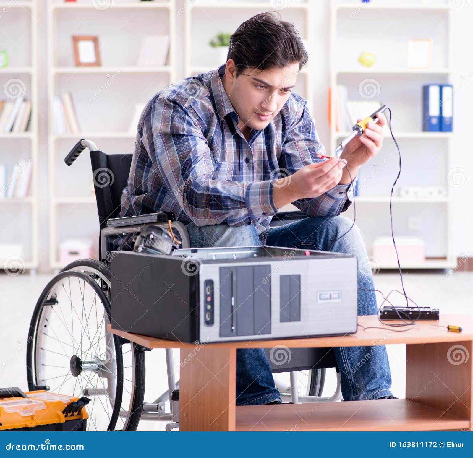 Disabled Man on Wheelchair Repairing Computer Stock Photo - Image of ...
