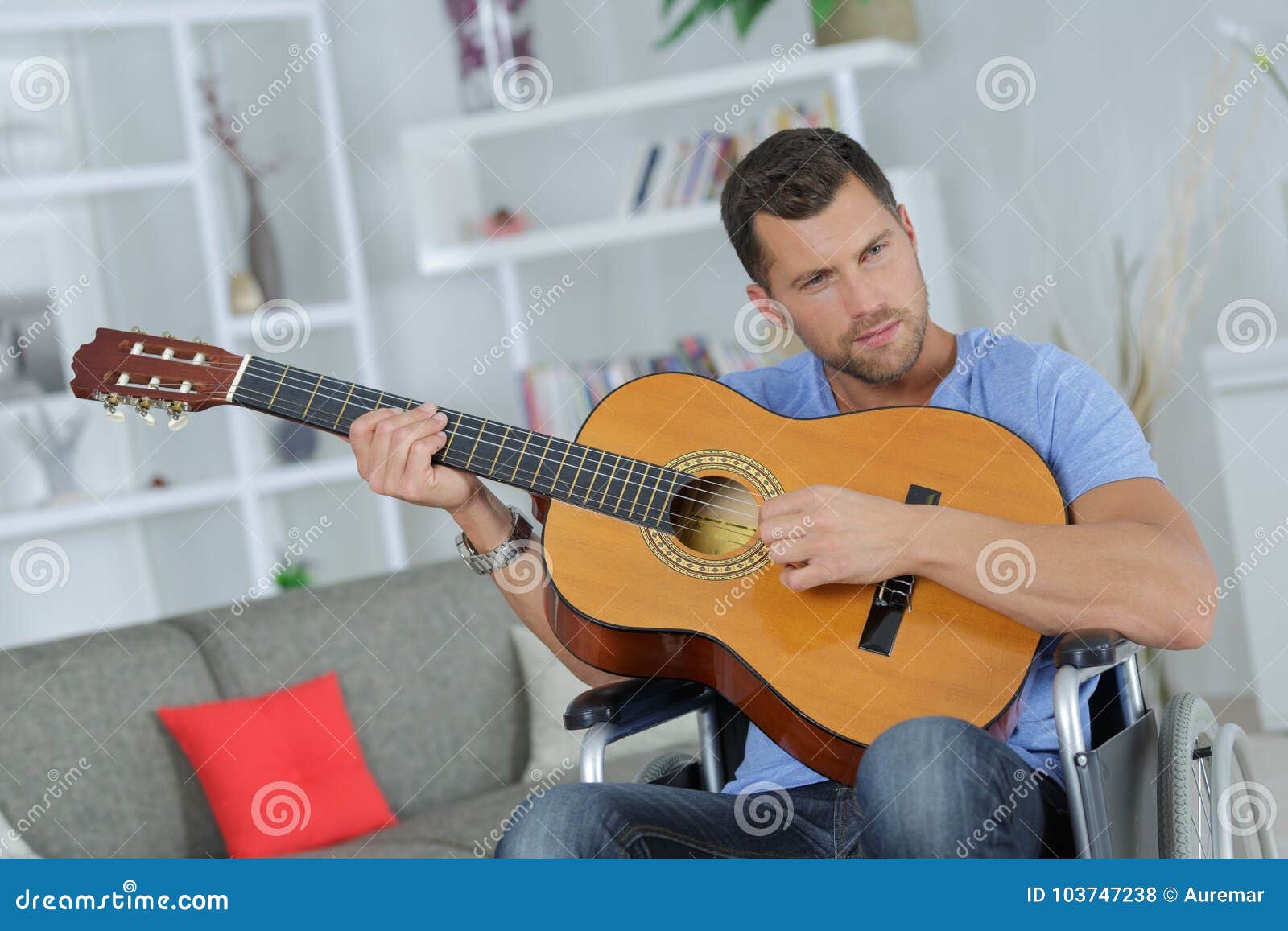 Disabled Musician Tuning Instrument Stock Photo - Image of home ...