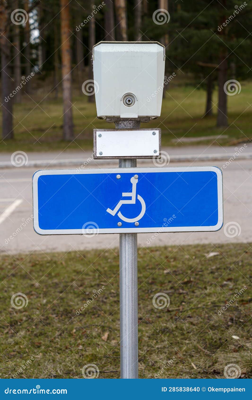 Disabled Parking Sign Below the Outdoor Power Socket Stock Photo ...
