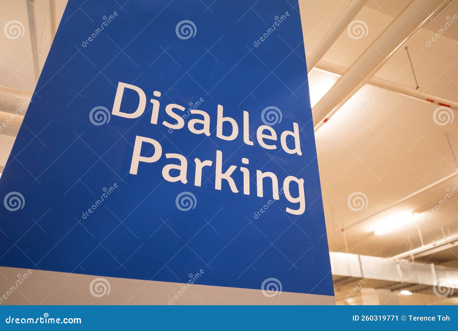 A Disabled Parking Sign Painted on a Building Column Stock Image ...