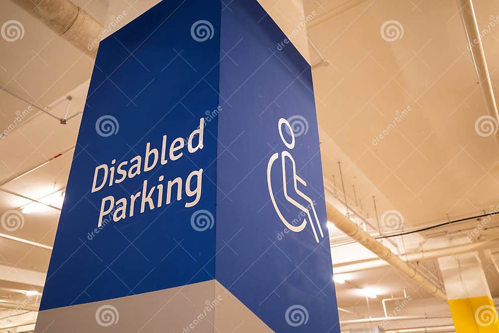 A Disabled Parking Sign Painted on a Building Column Stock Photo ... A Disabled Parking Sign Painted on a Building Column Stock Photo ...