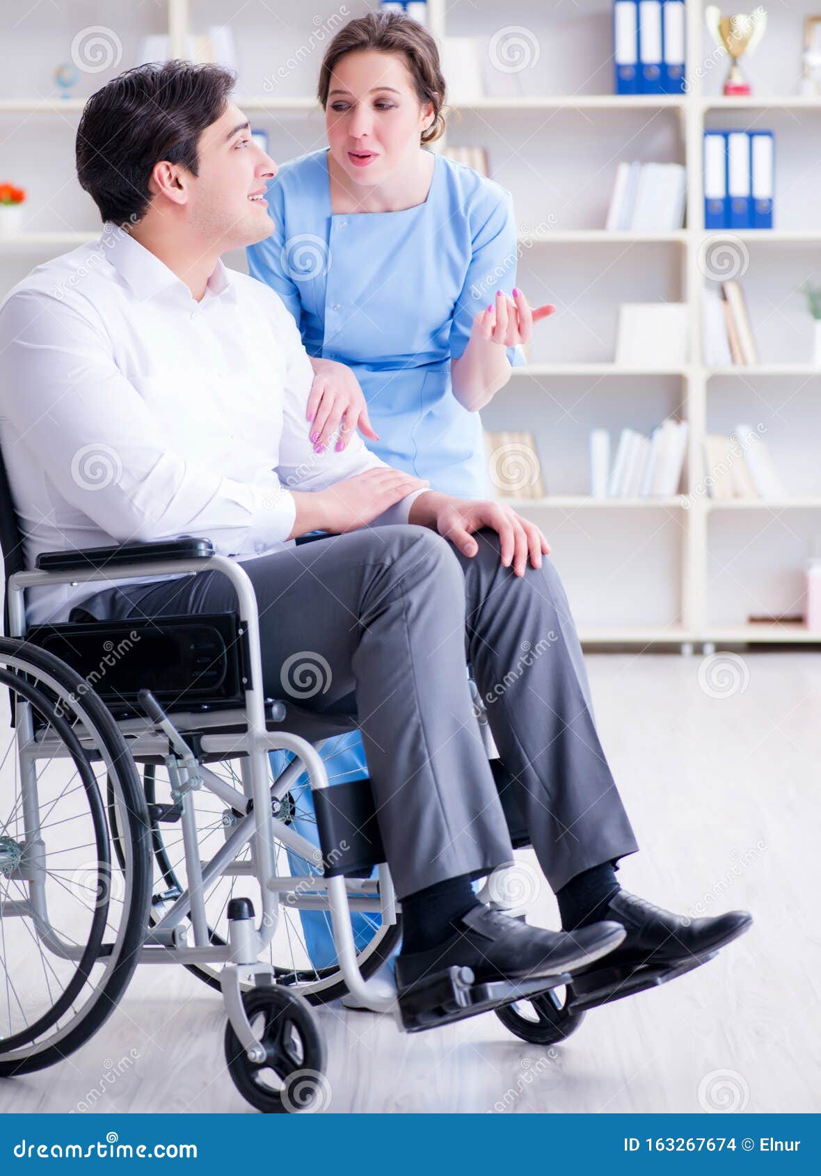 Disabled Patient on Wheelchair Visiting Doctor for Regular Check Stock ...