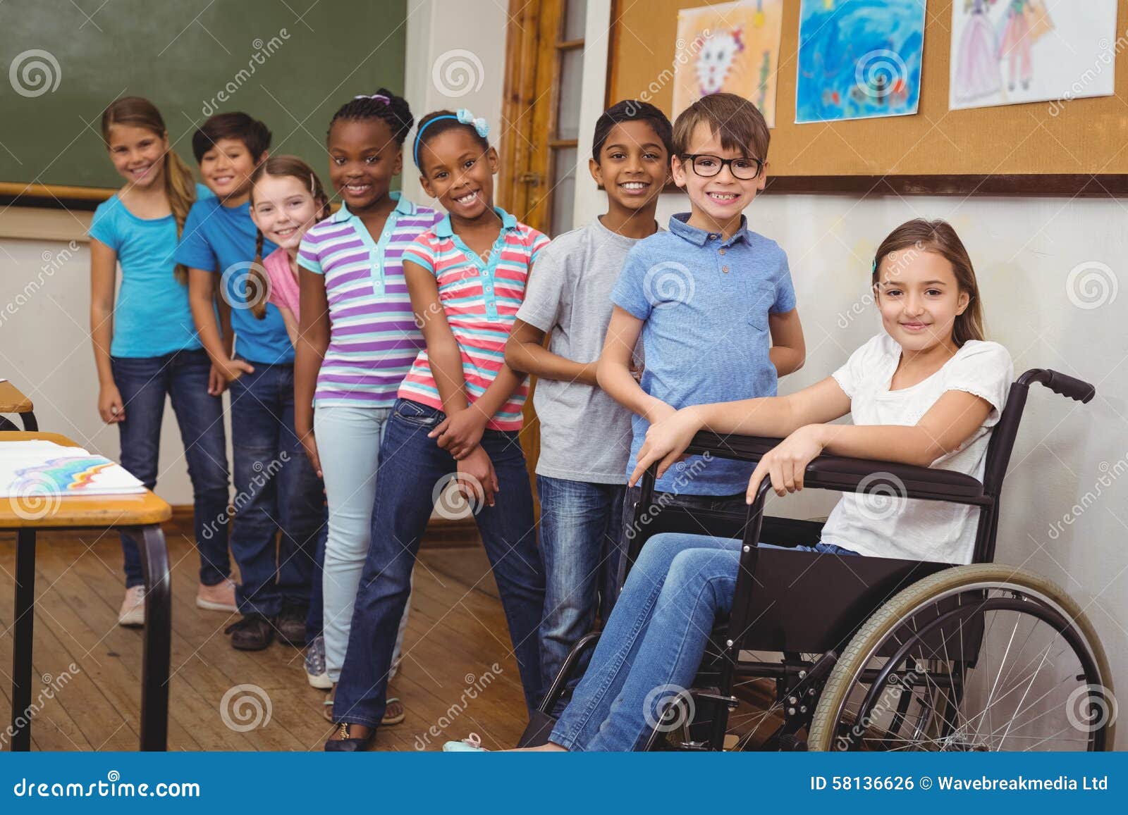 Disabled Pupil Smiling at Camera with Classmates Stock Photo - Image of ...