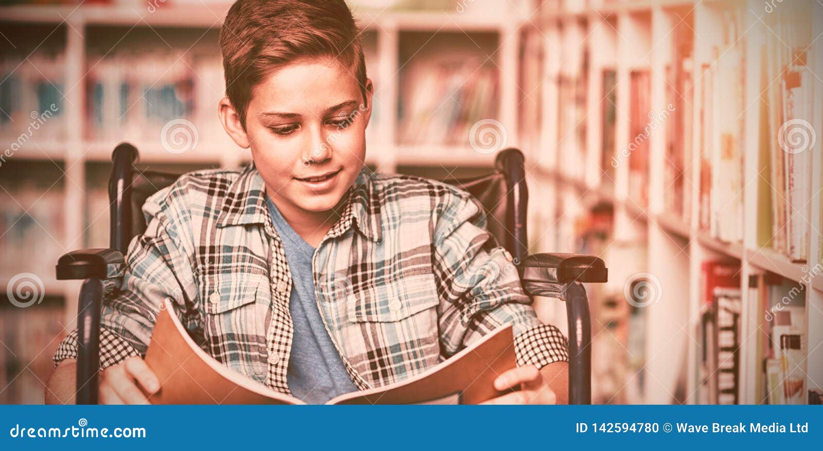 Disabled Schoolboy Reading Book in Library Stock Photo - Image of ... Disabled Schoolboy Reading Book in Library Stock Photo - Image of ...