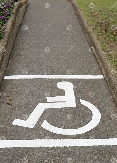 Disabled sign on pathway stock image. Image of accessible - 34572729