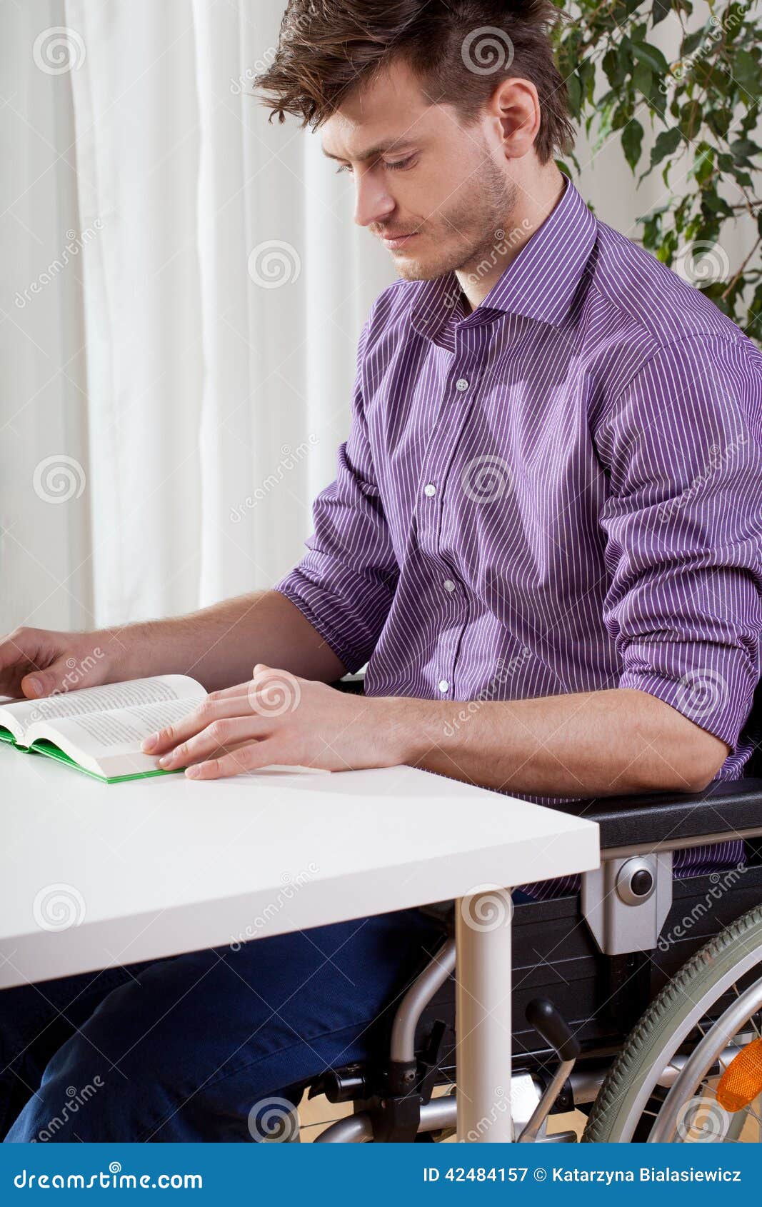 A Disabled Man Sitting In A Wheelchair Is Disappointed And Desperate To ...