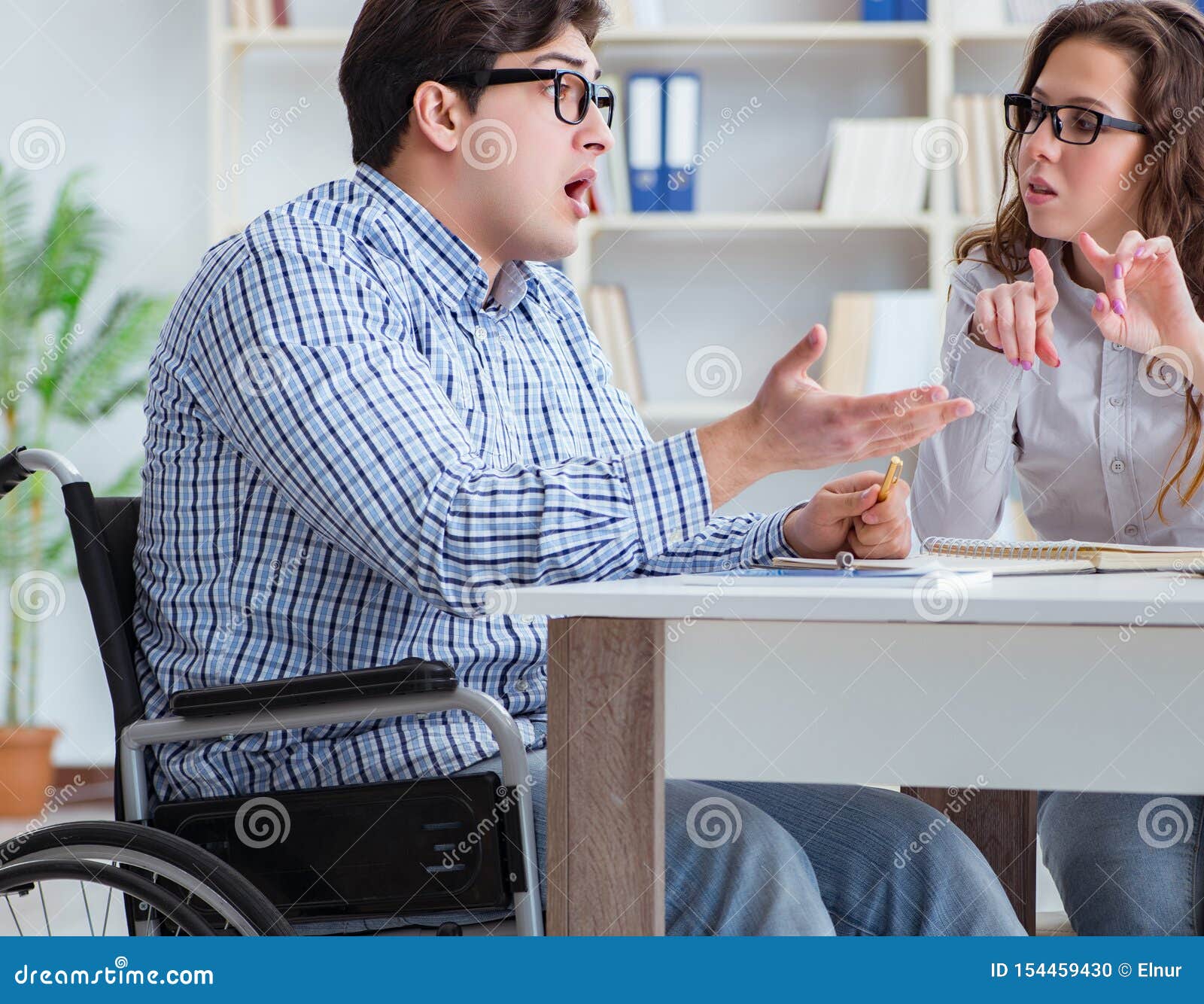 Disabled Student Studying and Preparing for College Exams Stock Photo ...