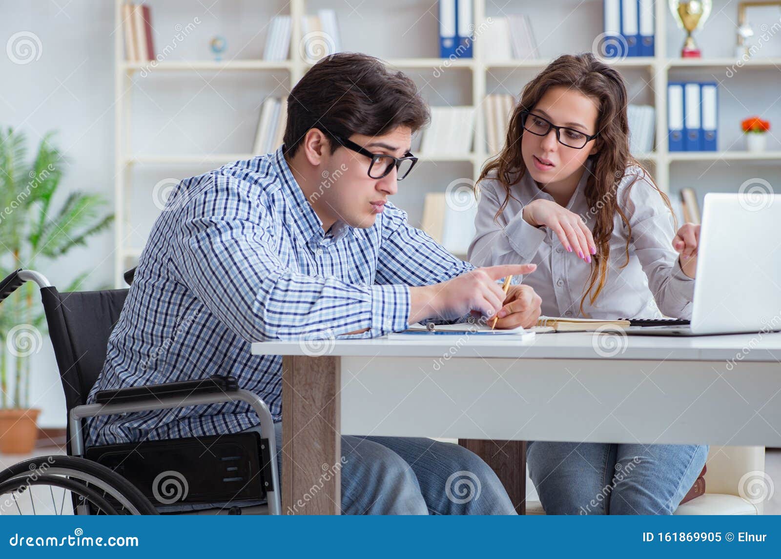 Disabled Student Studying and Preparing for College Exams Stock Image ...