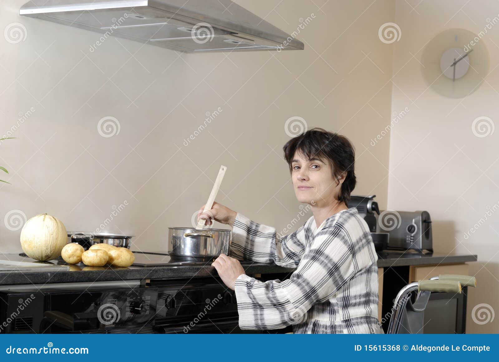Disabled Woman in Wheelchair Cooking Dinner Stock Photo - Image of ...
