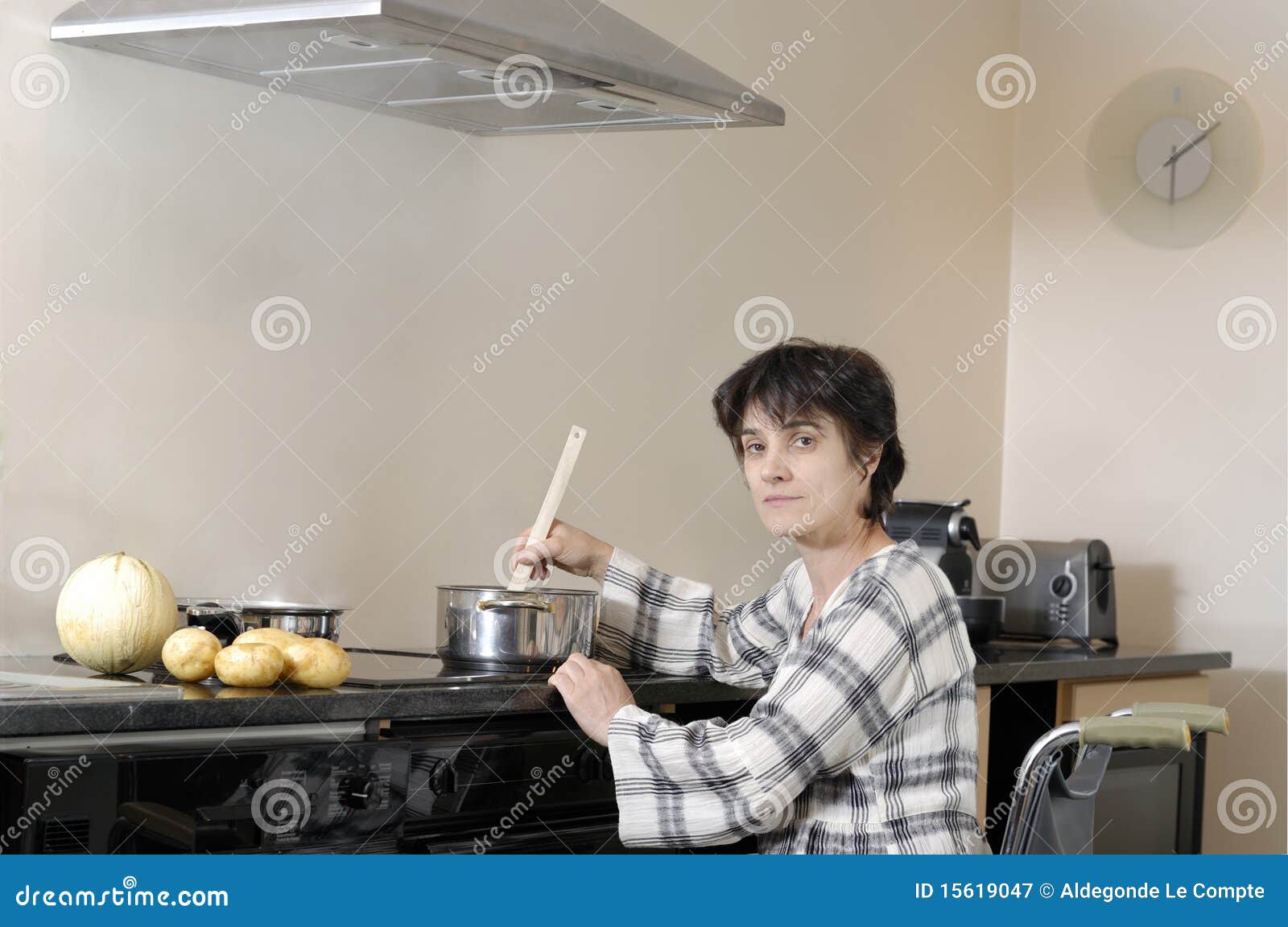 Disabled Woman In Wheelchair Cooking Dinner Royalty-Free Stock Photo ...