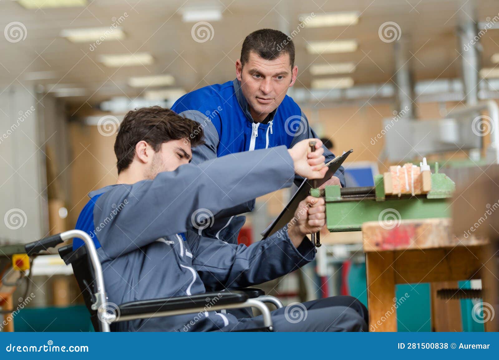 Disabled Worker in Wheelchair in Carpenters Workshop Stock Photo ...