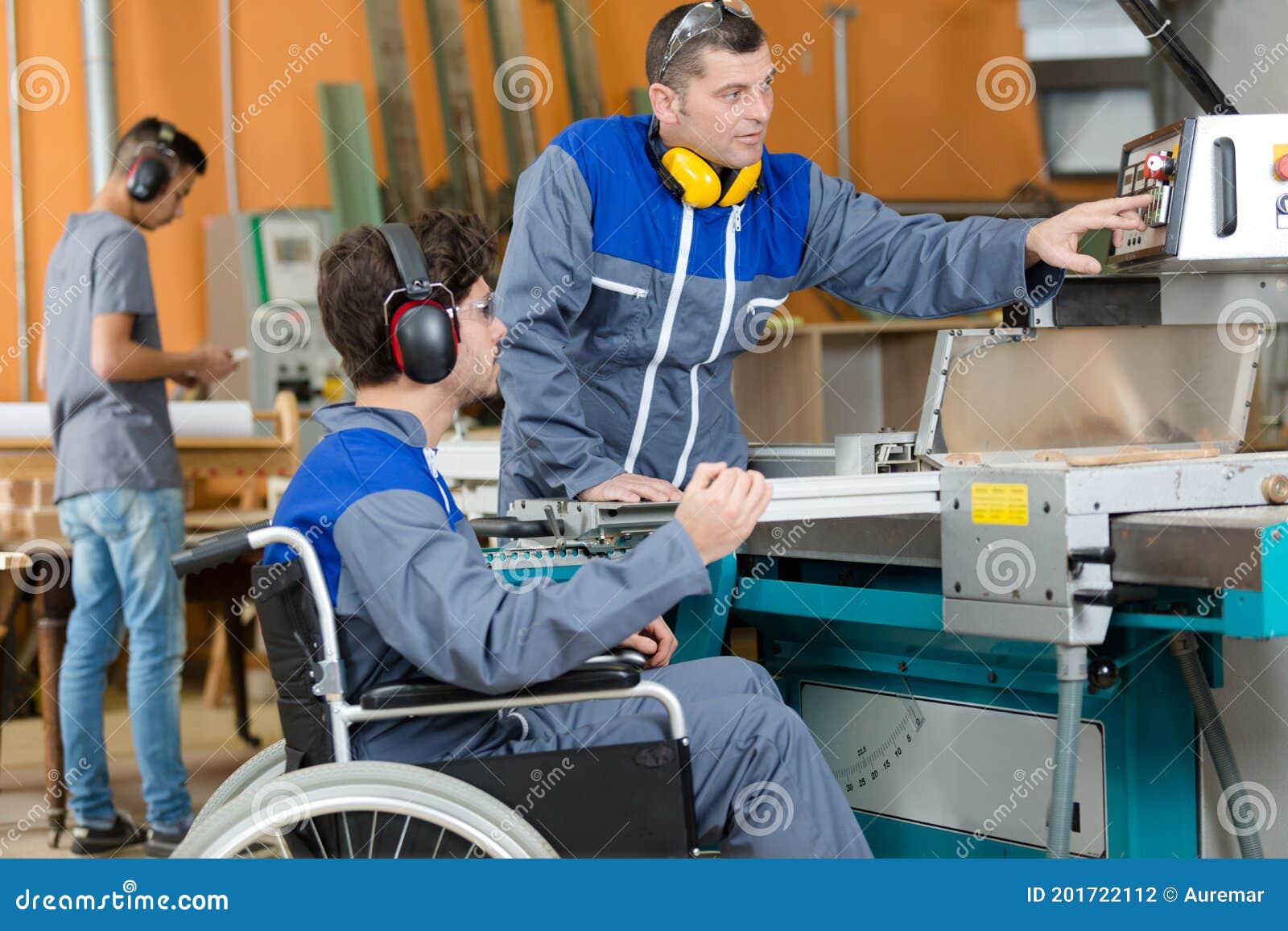 Disabled Worker in Wheelchair in Factory and Colleague Stock Photo ...