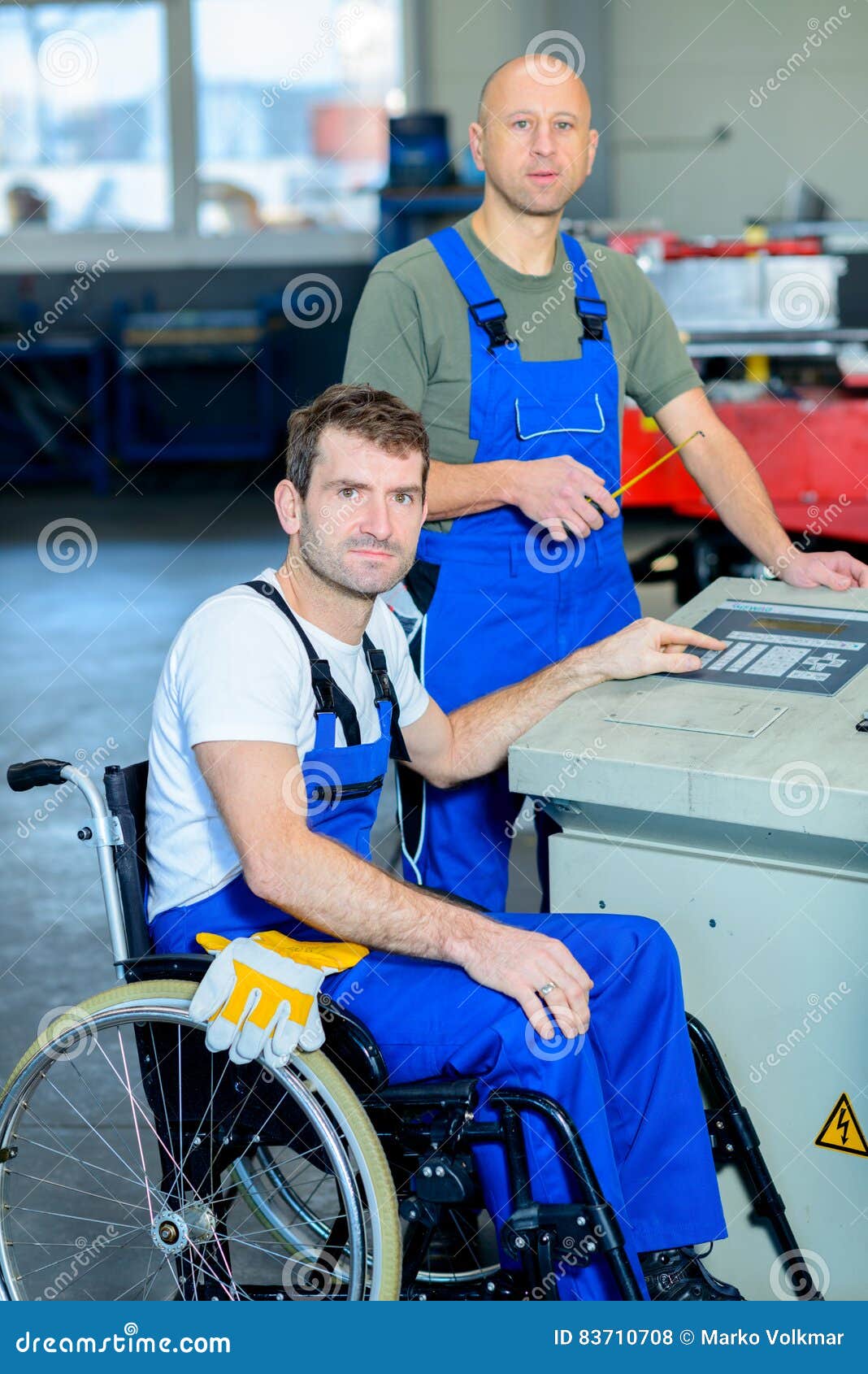 Disabled Worker in Wheelchair in Factory and Colleague Stock Photo ...