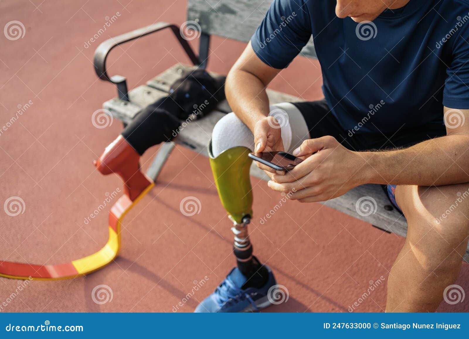 Disabled Young Athlete Using Phone Stock Photo - Image of active ...