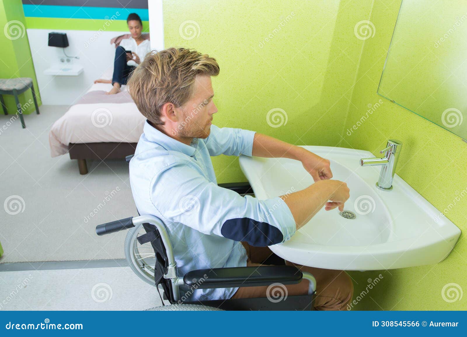Disabled Young Man in Wheelchair when Washing Hands Stock Photo - Image ...