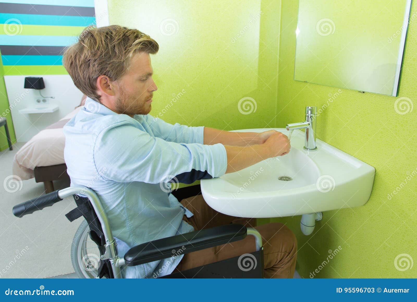 Disabled Young Man in Wheelchair when Washing Hands Stock Image - Image ...