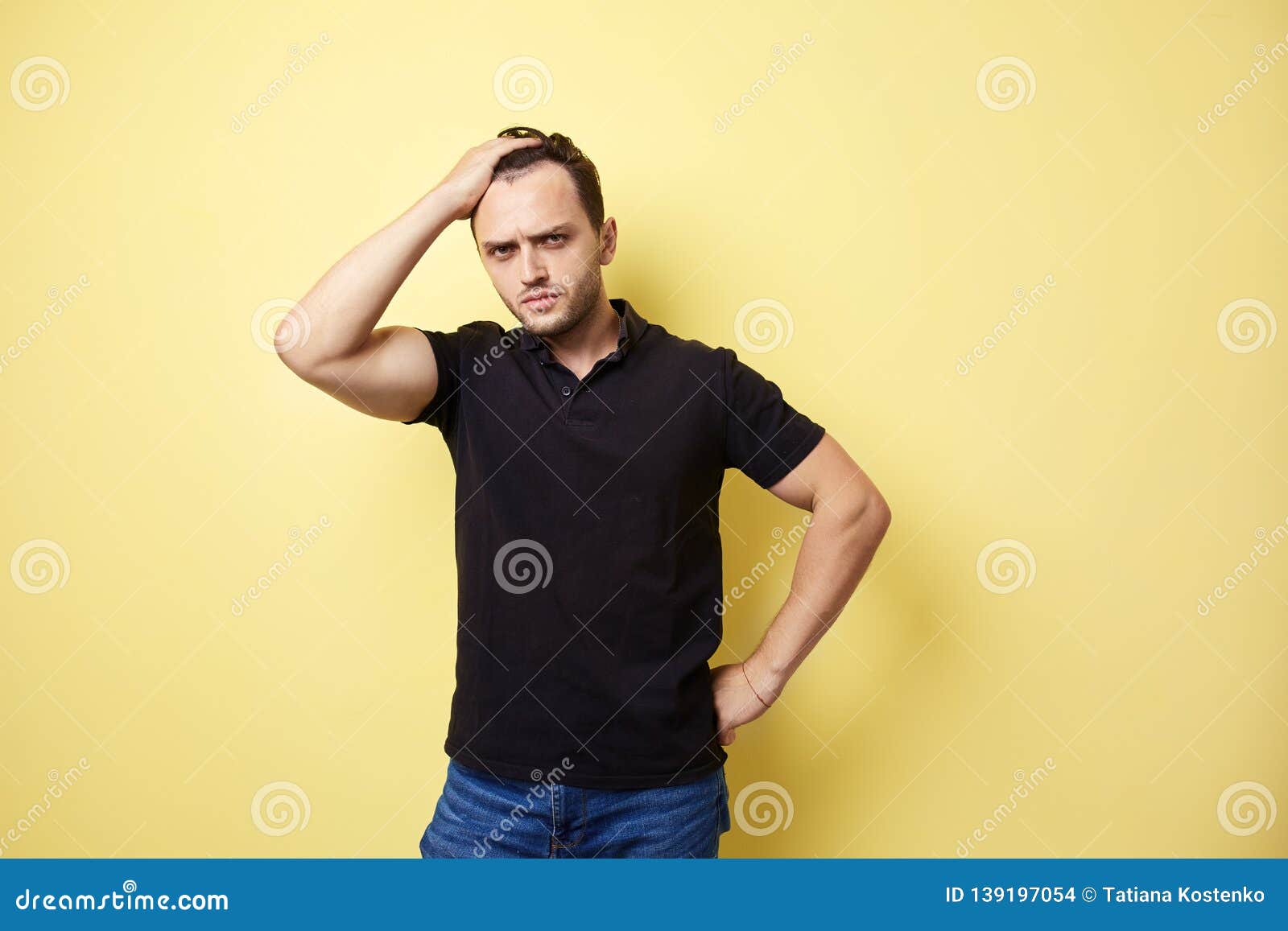 Disappointed Guy Dressed in the Black T-shirt Stock Photo - Image of ...