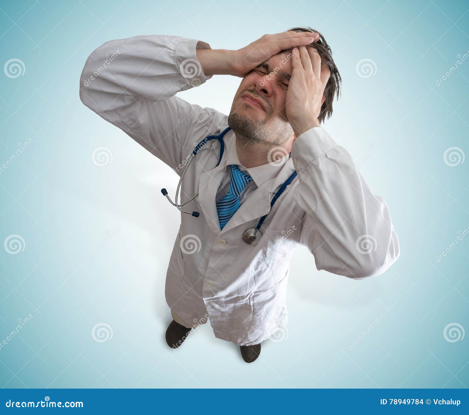 Stressed Doctor Suffering From Headache At Workplace Royalty-Free Stock ...