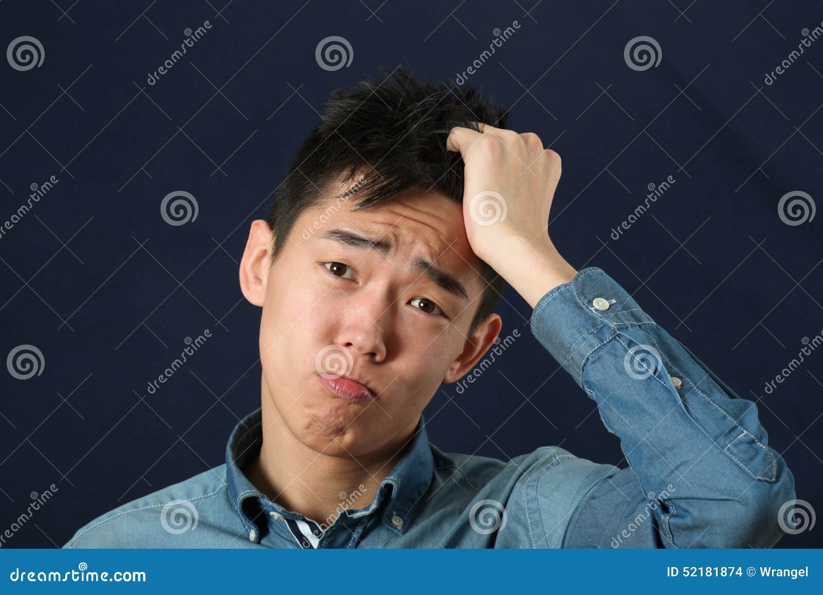Disappointed Young Asian Man Making Face and Looking at Camera Stock ...