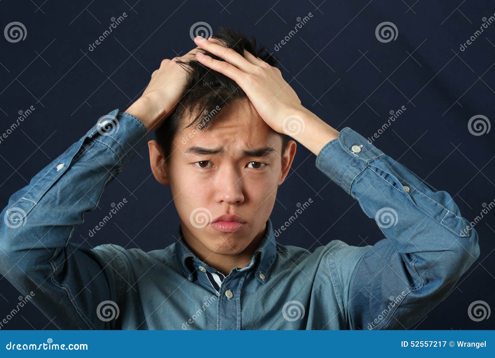 Disappointed Young Asian Man Making Face and Looking at Camera Stock ...