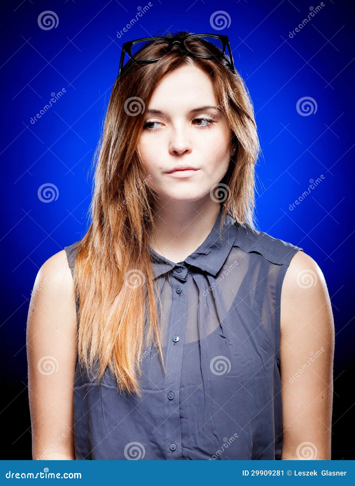 Disappointed Young Woman with Nerd Glasses on Head Looking Left Stock ...