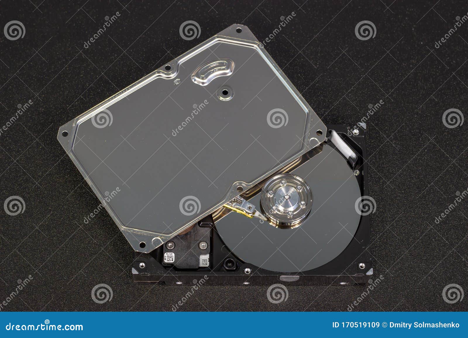Disassemble a Hard Drive from a Computer, a Hard Drive with a Mirror ...