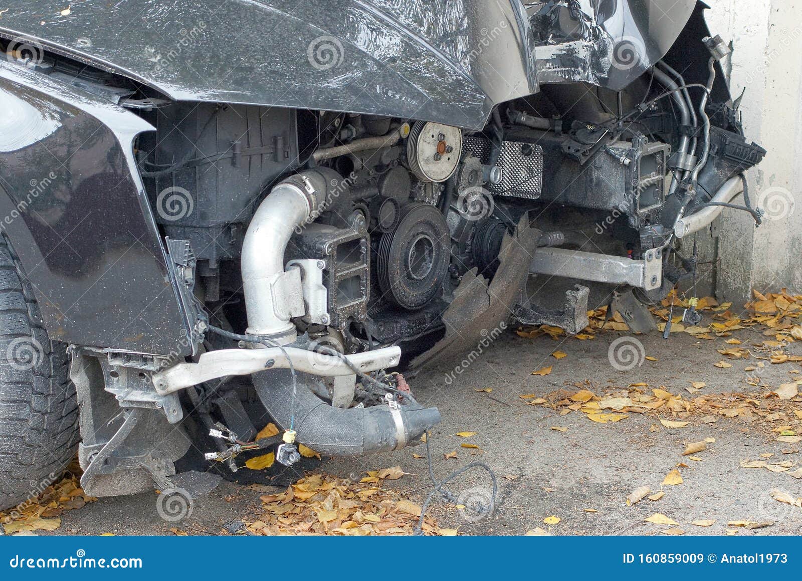Disassembled Broken Front Part of a Black Passenger Car on the Street ...