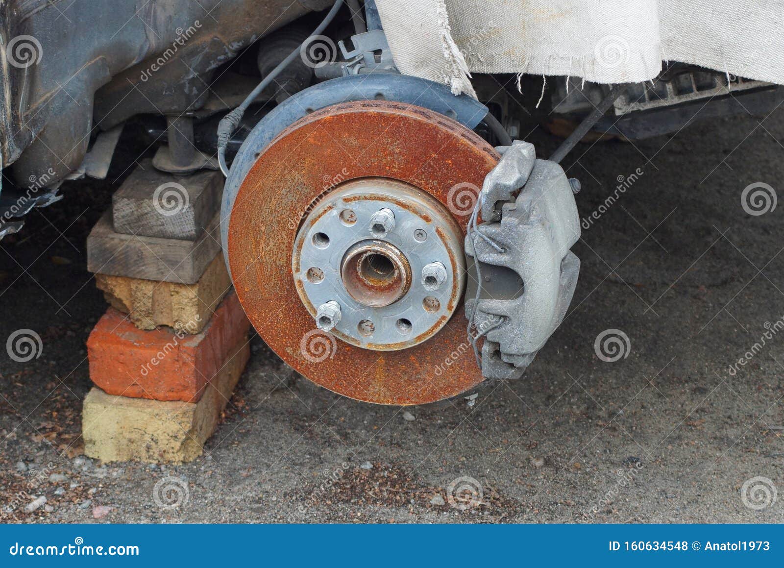 Disassembled Car with a Brake Shoe and a Crumpled Wing Stock Photo ...