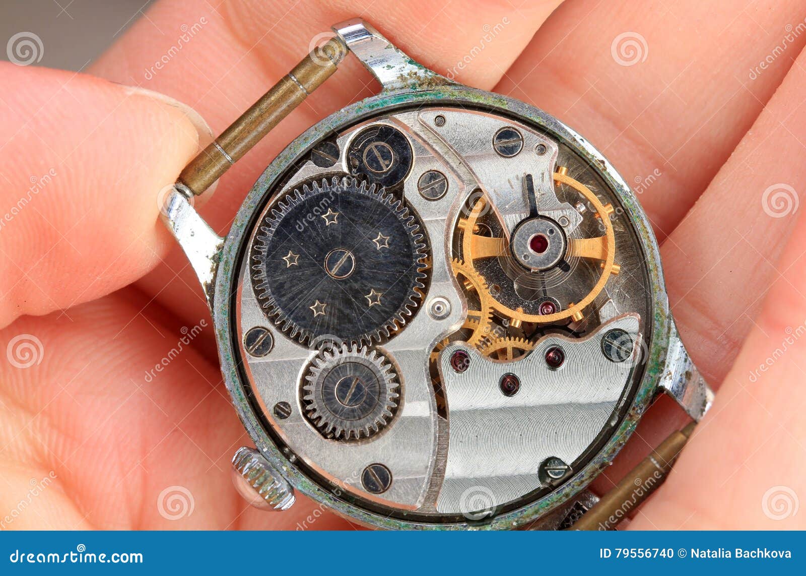 Disassembled Clock Gears are in the Hand of the Master Stock Photo ...