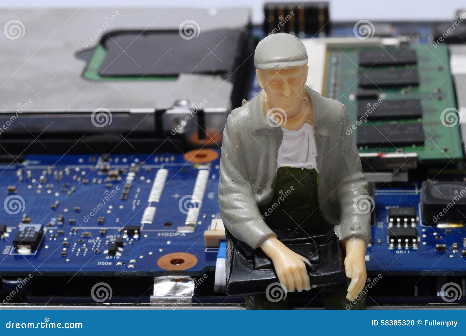 Disassembled Computer Components and People Figurines Stock Photo ...