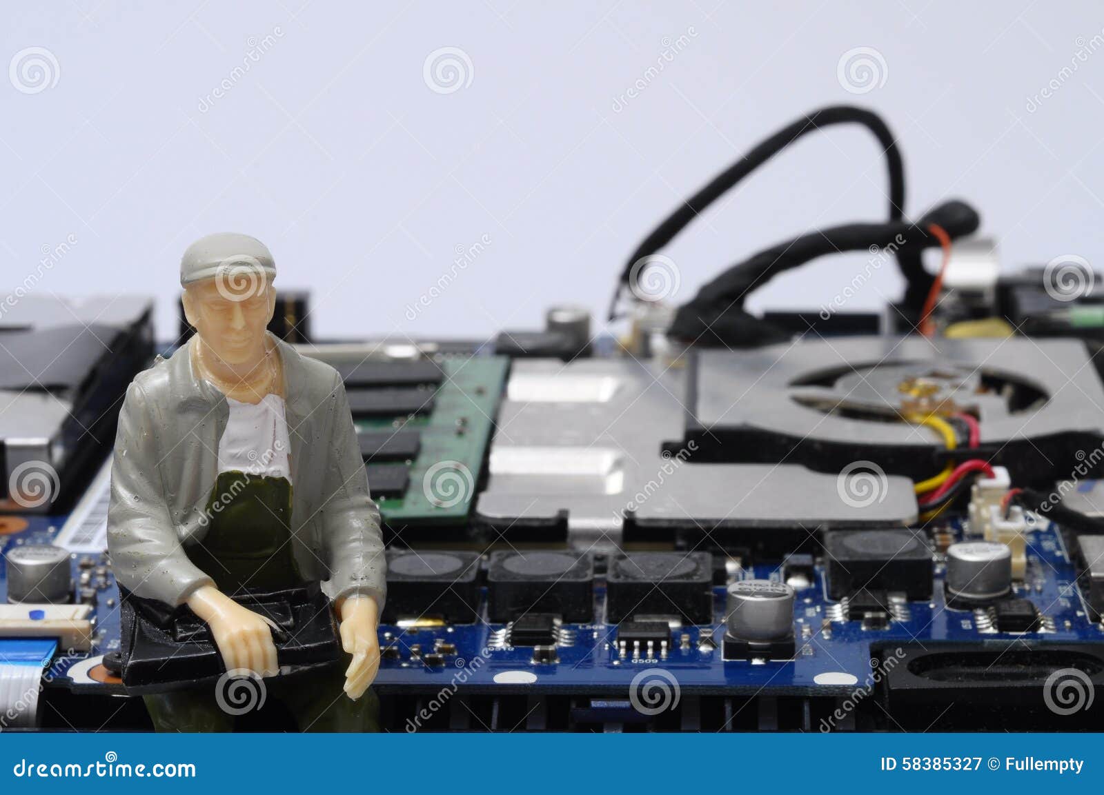 Disassembled Computer Components and People Figurines Stock Image ...