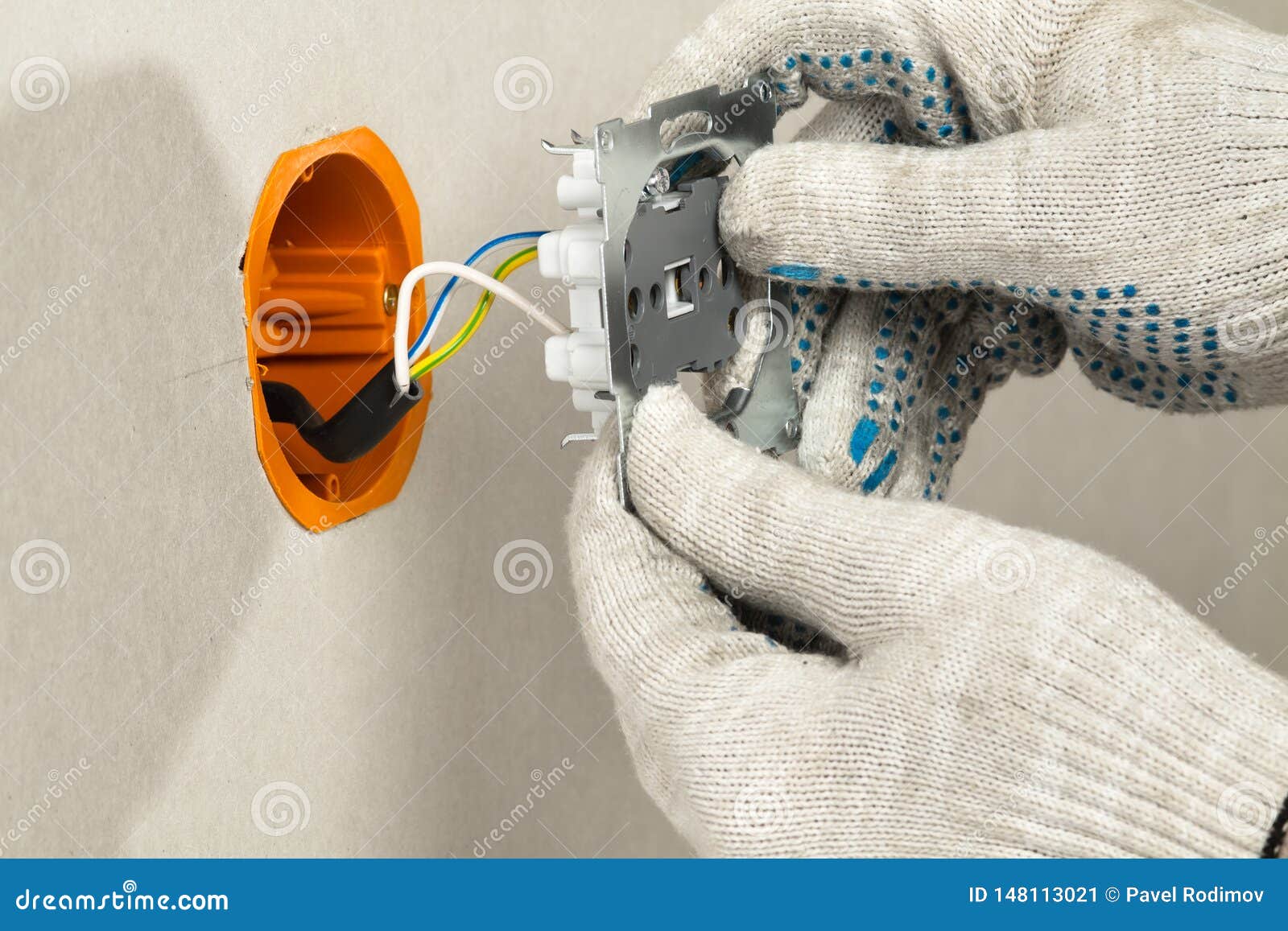 Disassembled Electrical Outlet is in the Hands of an Electrician Stock ...