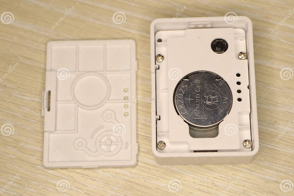 Disassembled Electronic Device Featuring a Battery Compartment for ...