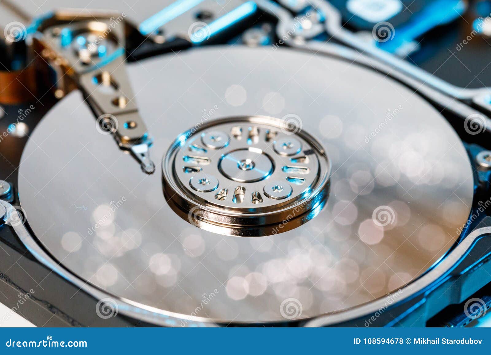 Disassembled Hard Disk, Magnetic Heads and Polished Plates Illuminated ... Disassembled Hard Disk, Magnetic Heads and Polished Plates Illuminated ...