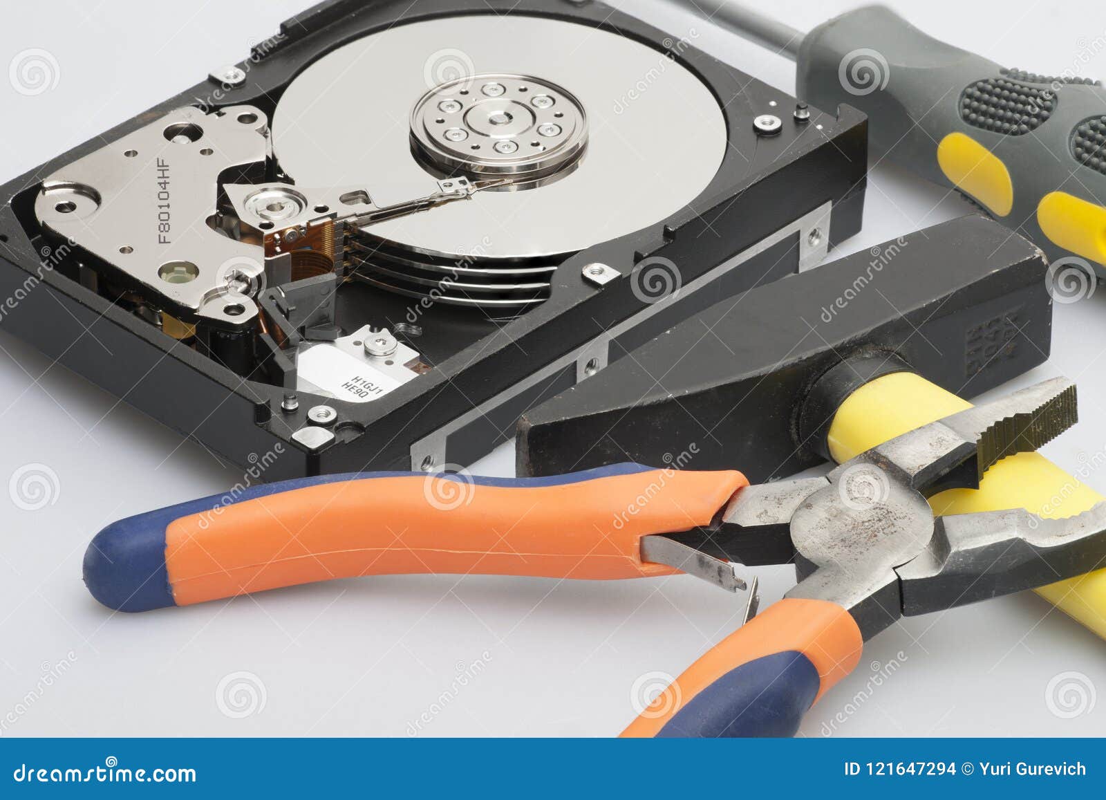 The Disassembled Hard Drive Next To the Tools with Which it Was ...