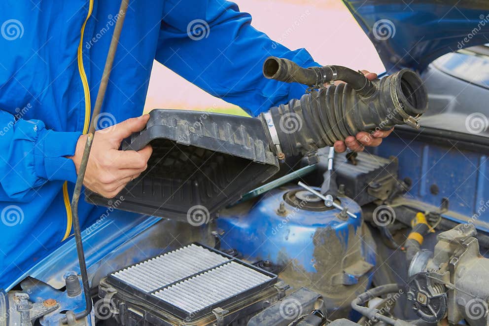 Disassembling the Air Filter in a Car, Mechanic Disassembles the Engine ...