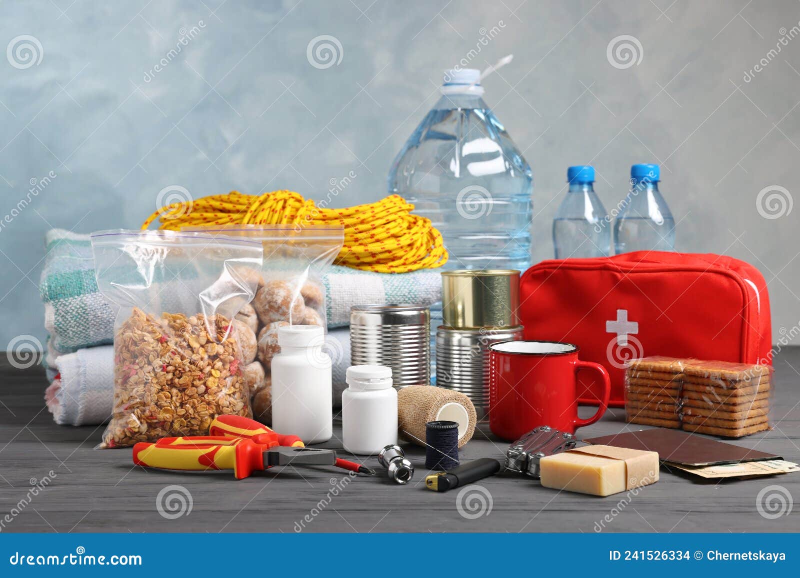 Disaster Supply Kit for Earthquake on Black Wooden Table Stock Photo ... Disaster Supply Kit for Earthquake on Black Wooden Table Stock Photo ...