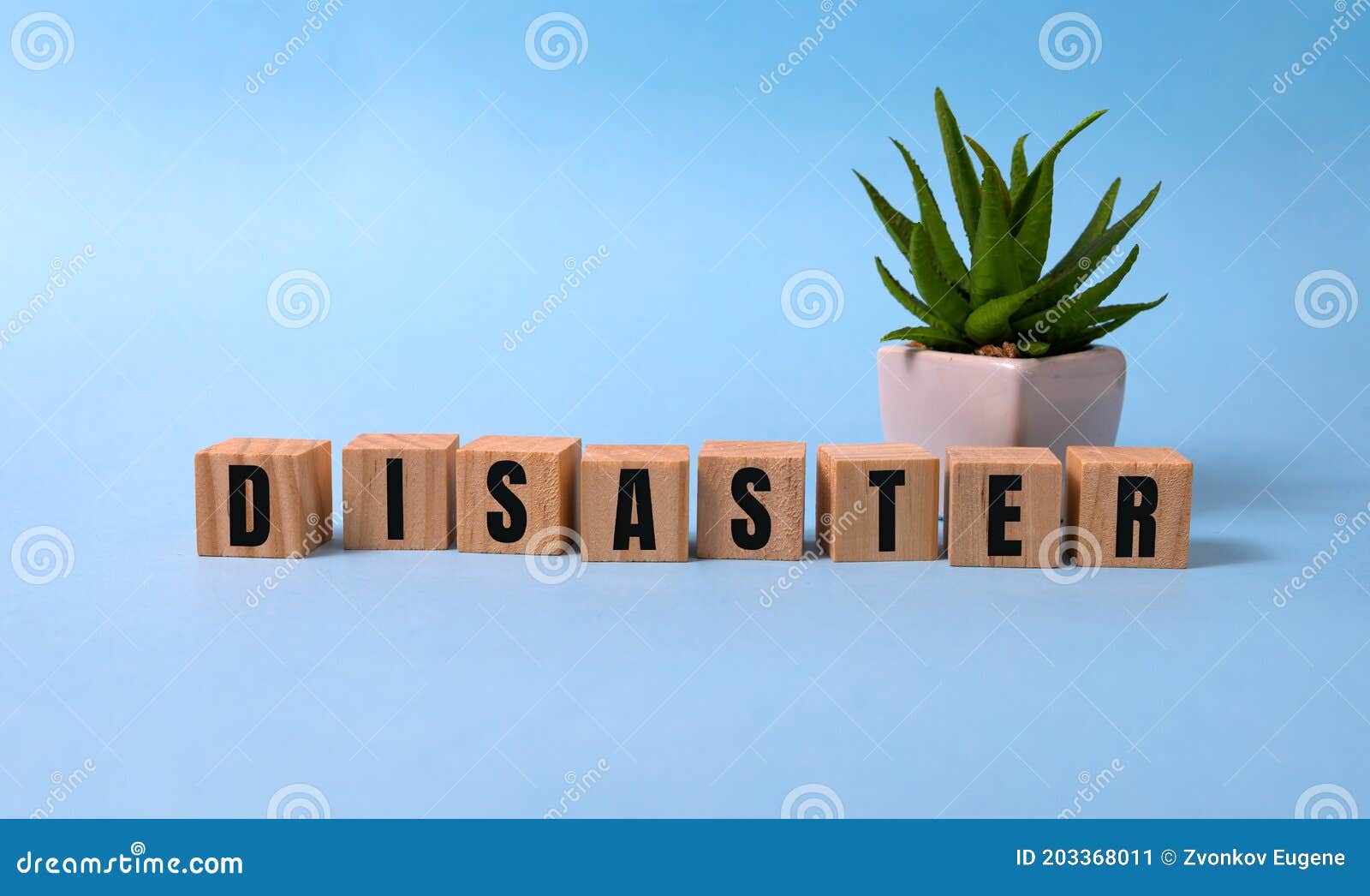 Disaster Word Written on Wooden Blocks on Blue Stock Image - Image of ...