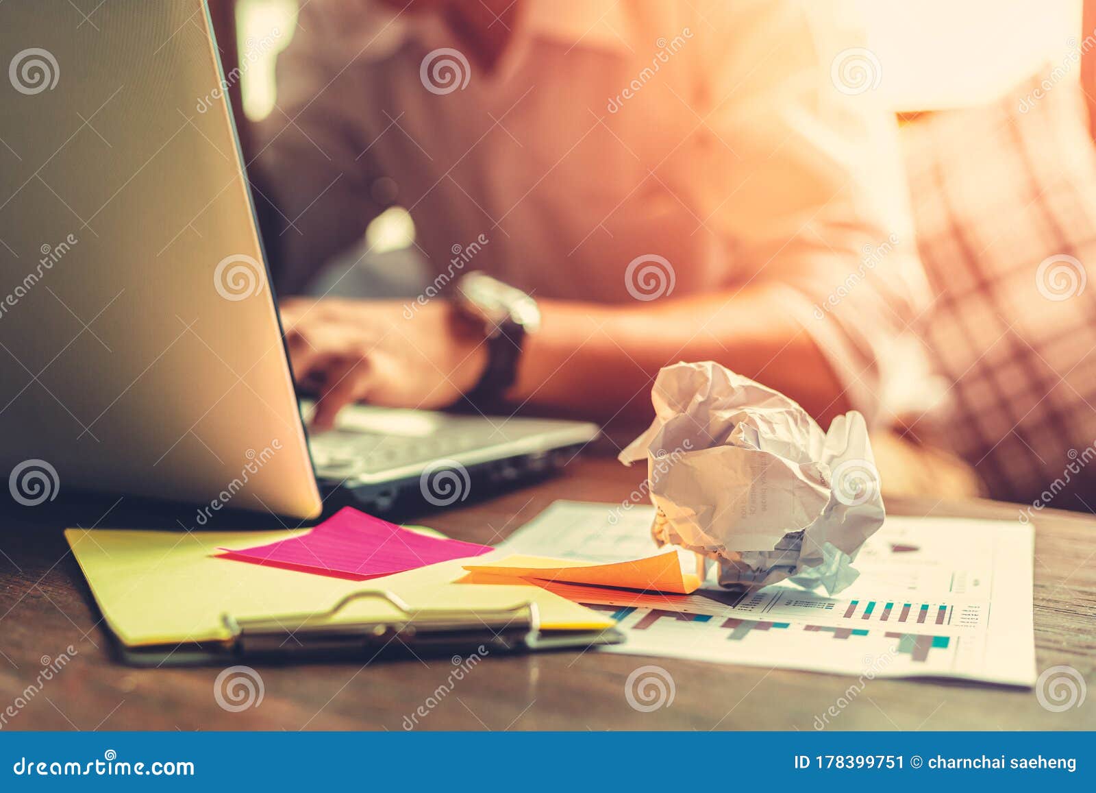 Disastrously Paper on Paper Graph Chart and Blur Businessman Working ...