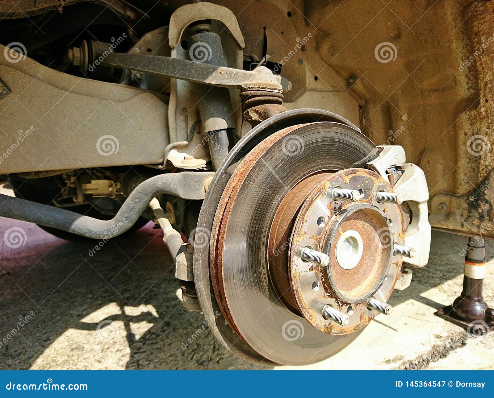 Disc Break of Car with Jack in Process for New Tire Replacement Stock ...