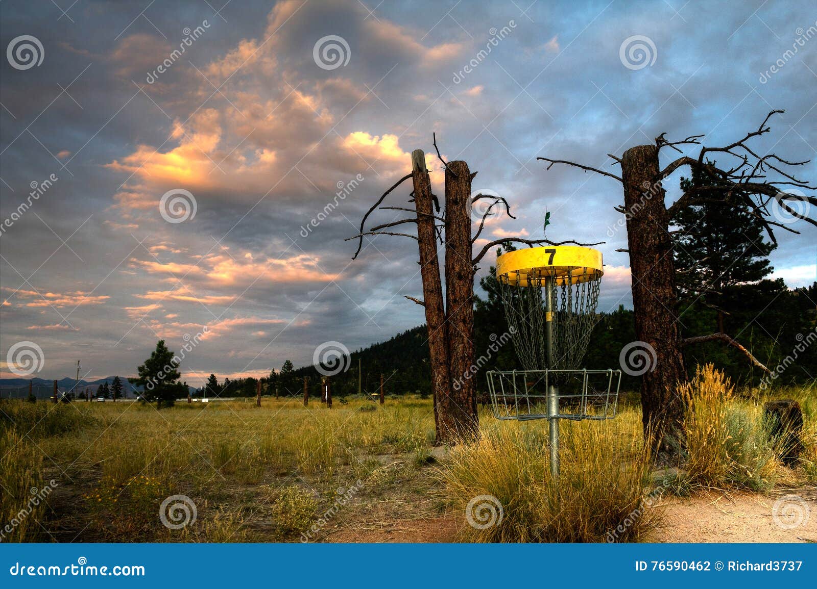 Disc Golf Basket at Sunset stock photo. Image of mountains - 76590462